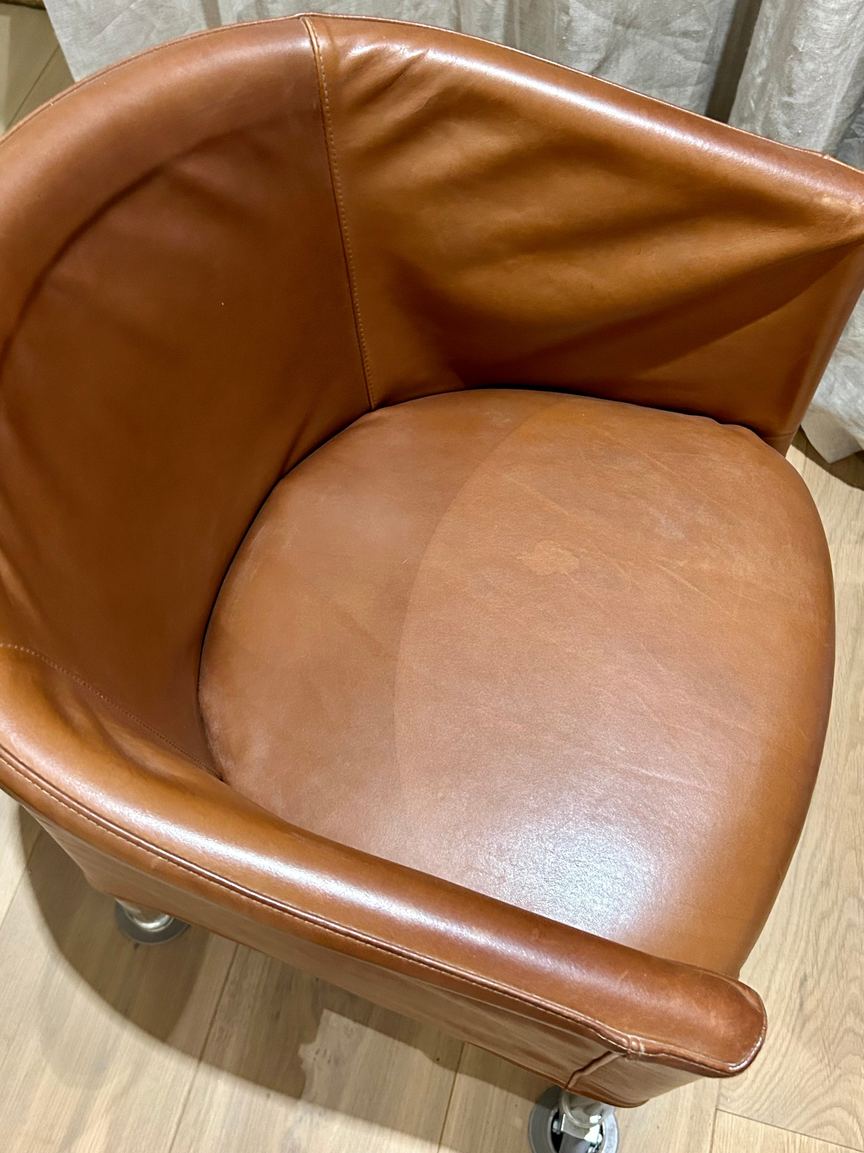 A pair of mixer Leather Chairs By Flexform – LOT.co.uk