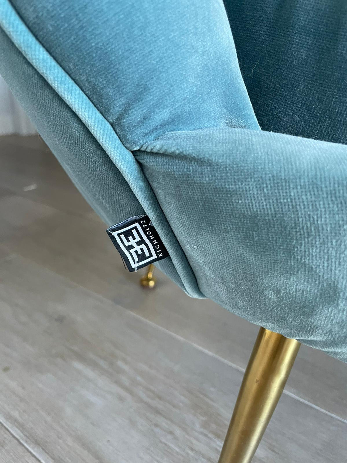 An Eichholtz Trapezium blue velvet chair – LOT.co.uk