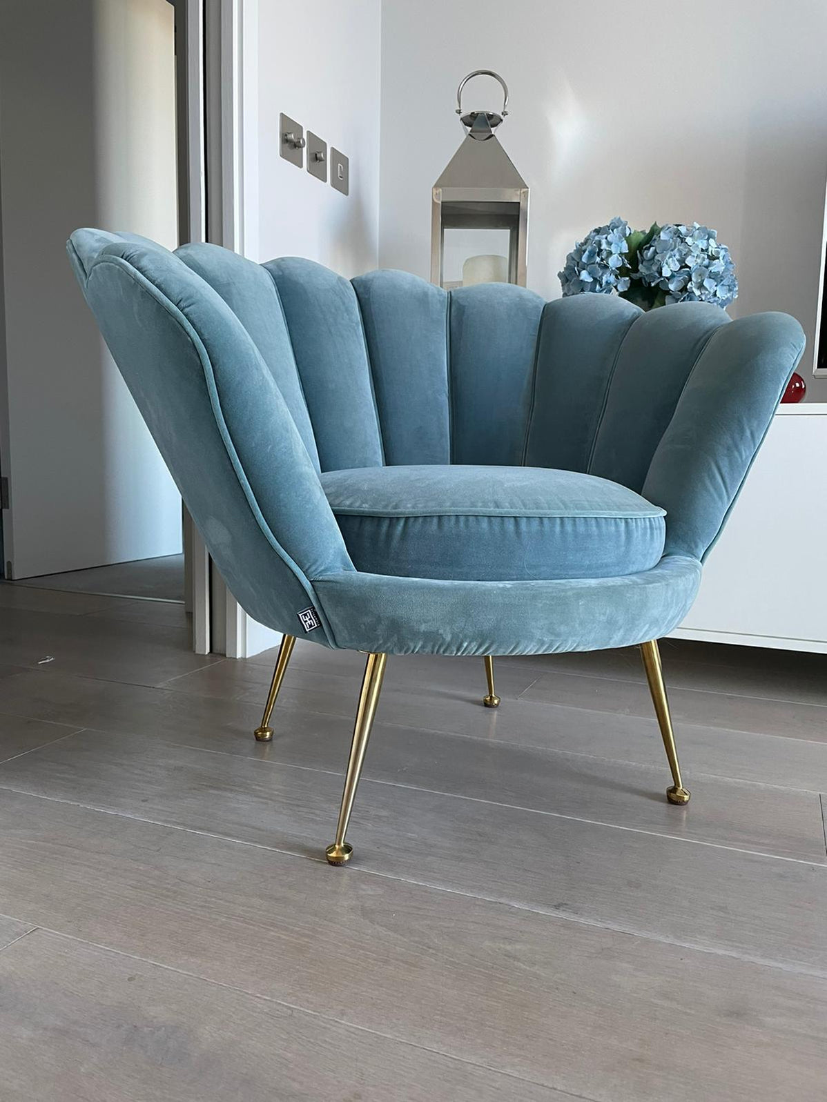 An Eichholtz Trapezium blue velvet chair – LOT.co.uk